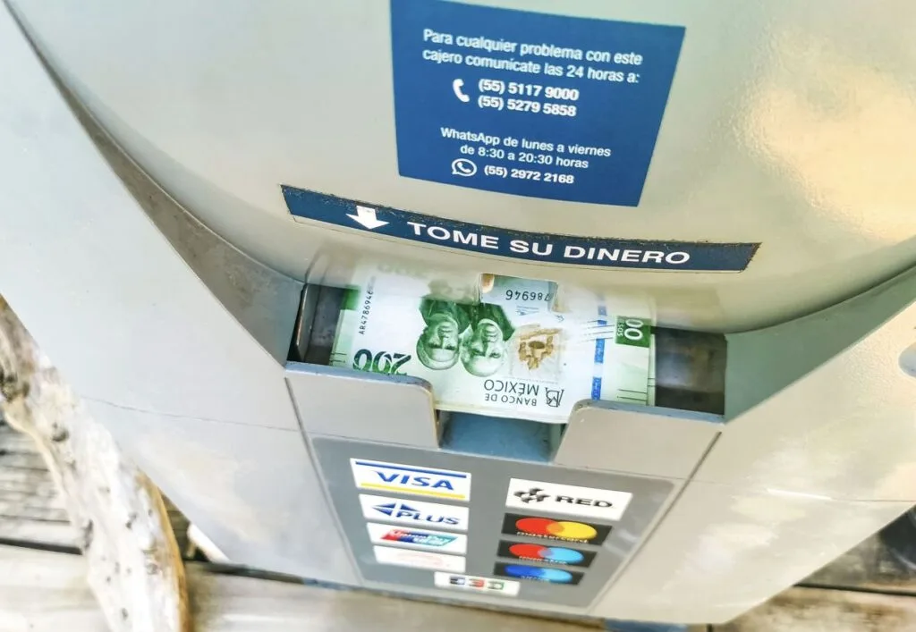 Withdrawing $100 At A Cancun ATM Could Cost You An Extra $20 & How To ...